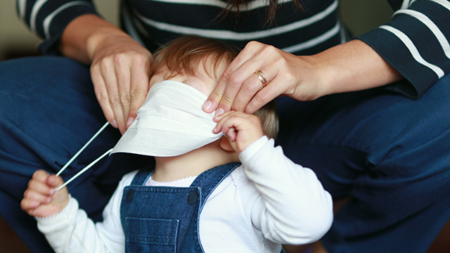 Should You Be Putting a Tiny Face Mask on Your Baby?