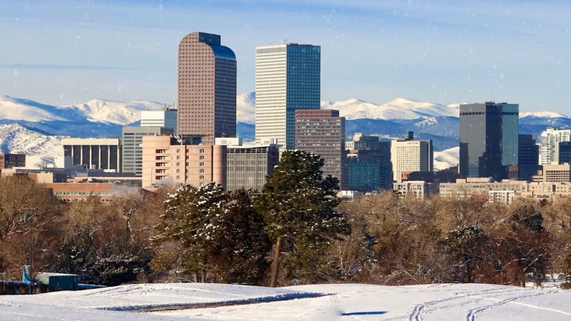 What US cities typically see snow in September?