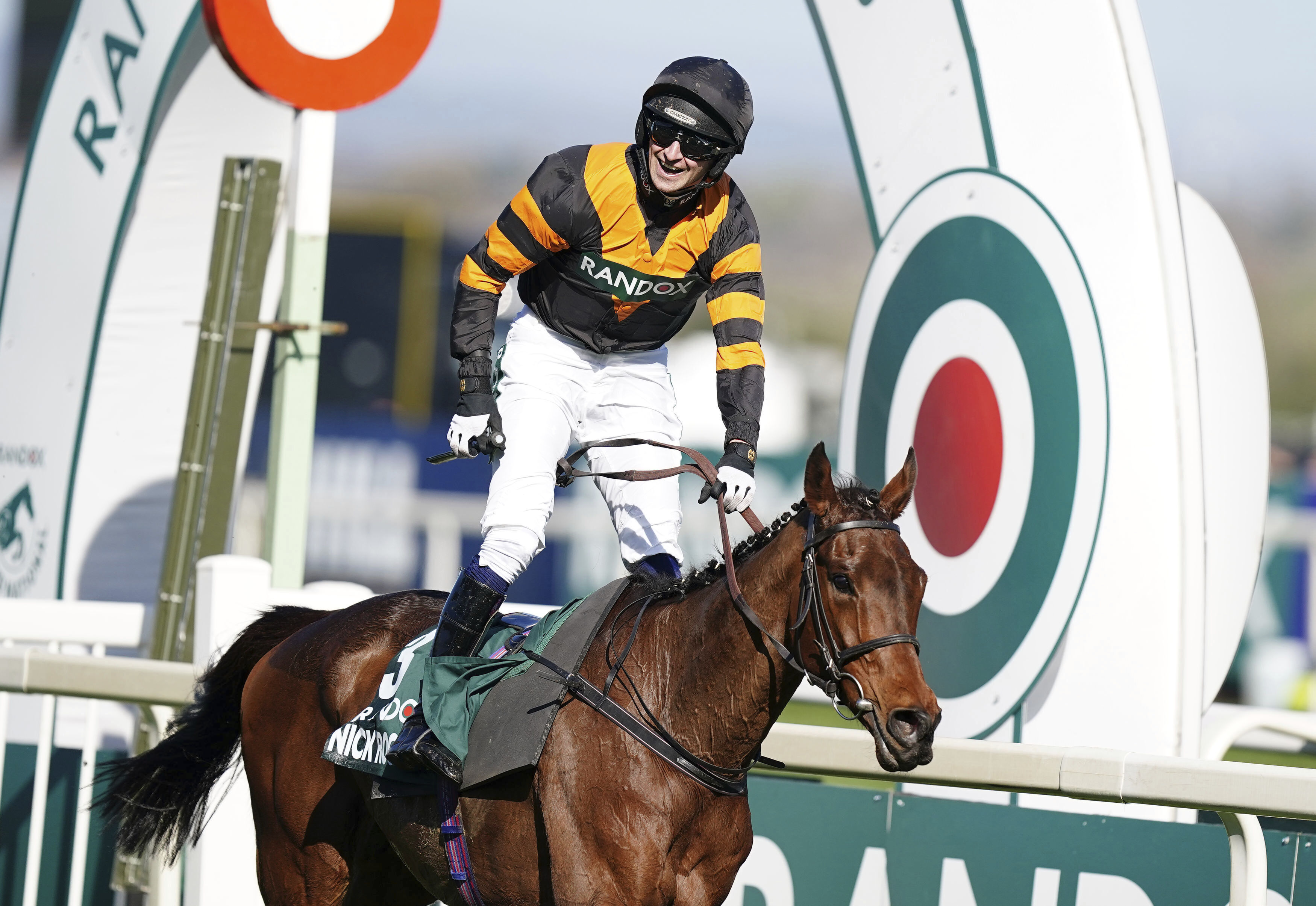 Father-and-son combination wins the Grand National as Nick Rockett ...