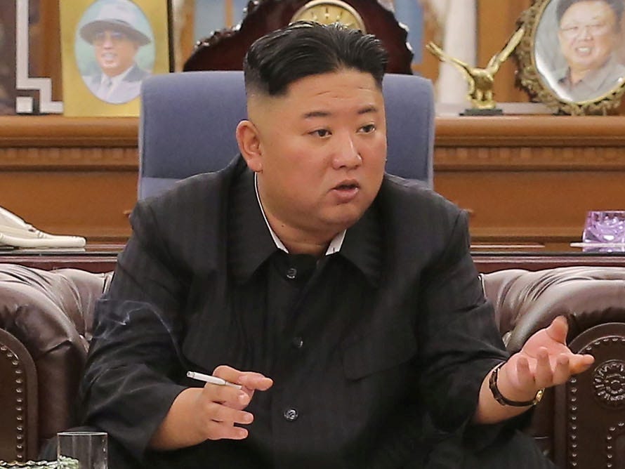 Kim Jong Un can be seen struggling to walk down stairs in a new North ...