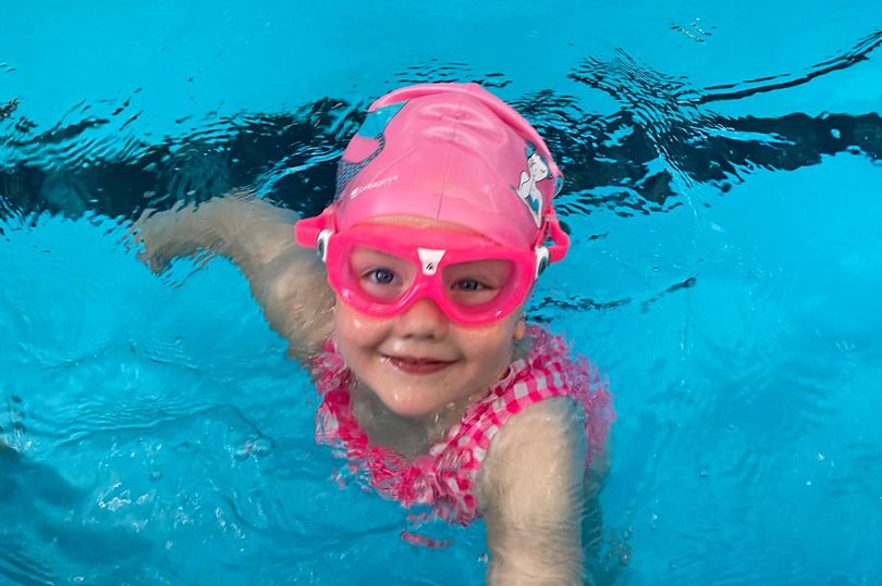 Three year old Edith earns swimming badge thanks to mum and Puddle Ducks