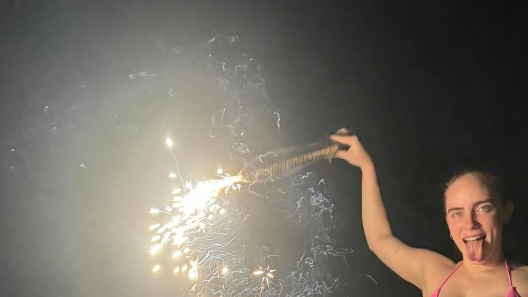 Billie Eilish Wore A Pink String swimsuit With A Twist In Her Summer ...