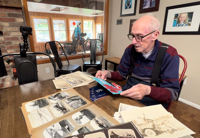 WWII photographer honored for 100 years of service to country, community