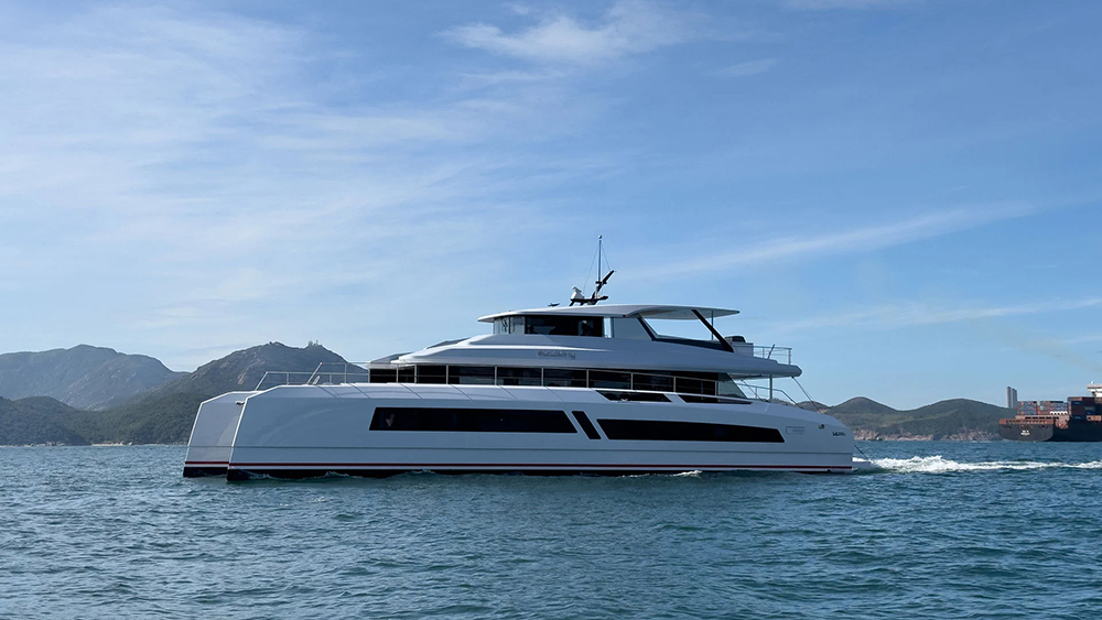 Watch: A Sleek New 78-Foot Catamaran Hits the Water Off Hong Kong
