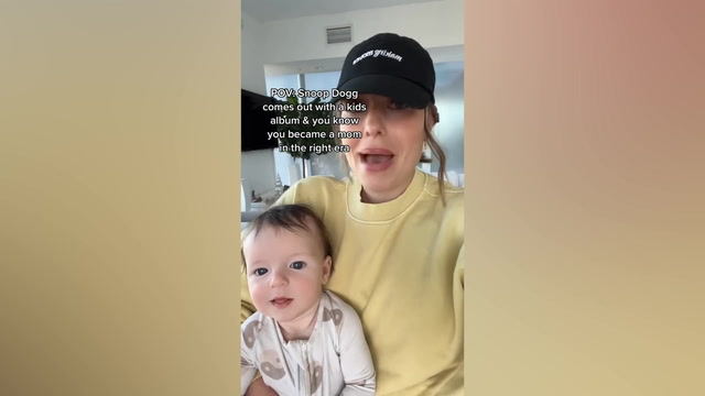 Mother and child dance to Snoop Dogg's new album for children