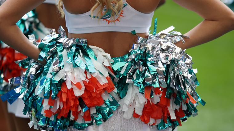 Dolphins cheerleader, Netflix star rocks jersey as dress in Madrid ...
