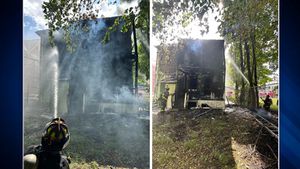 Firefighters rescue woman from burning building in Boston, officials say