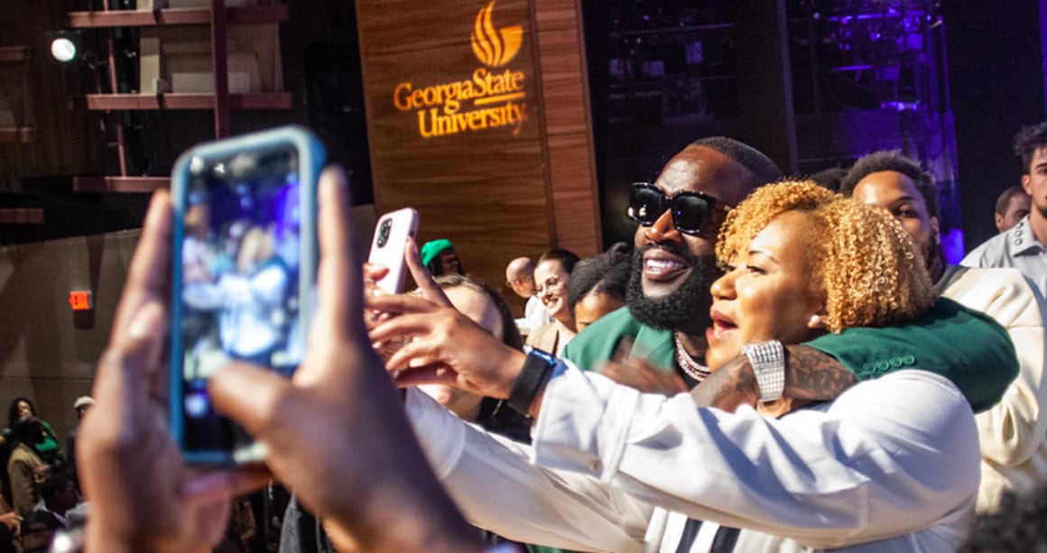 Atlanta rapper Rick Ross engages with GSU students who are studying a ...